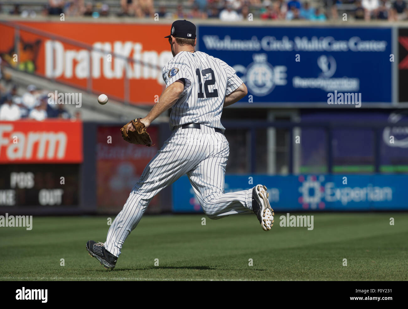 New York, New York, USA. 22nd Aug, 2015. Yankees' CHASE HEADLEY chases ...