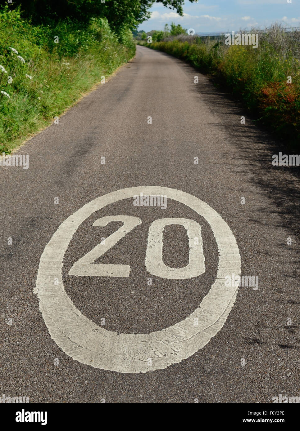 20 mph speed limit sign on minor country road Stock Photo - Alamy