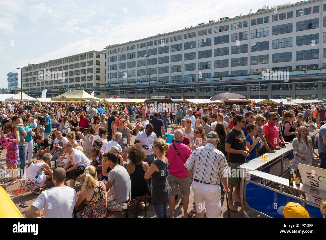 Visitors of the "feel good market" at the former Philips territory ...