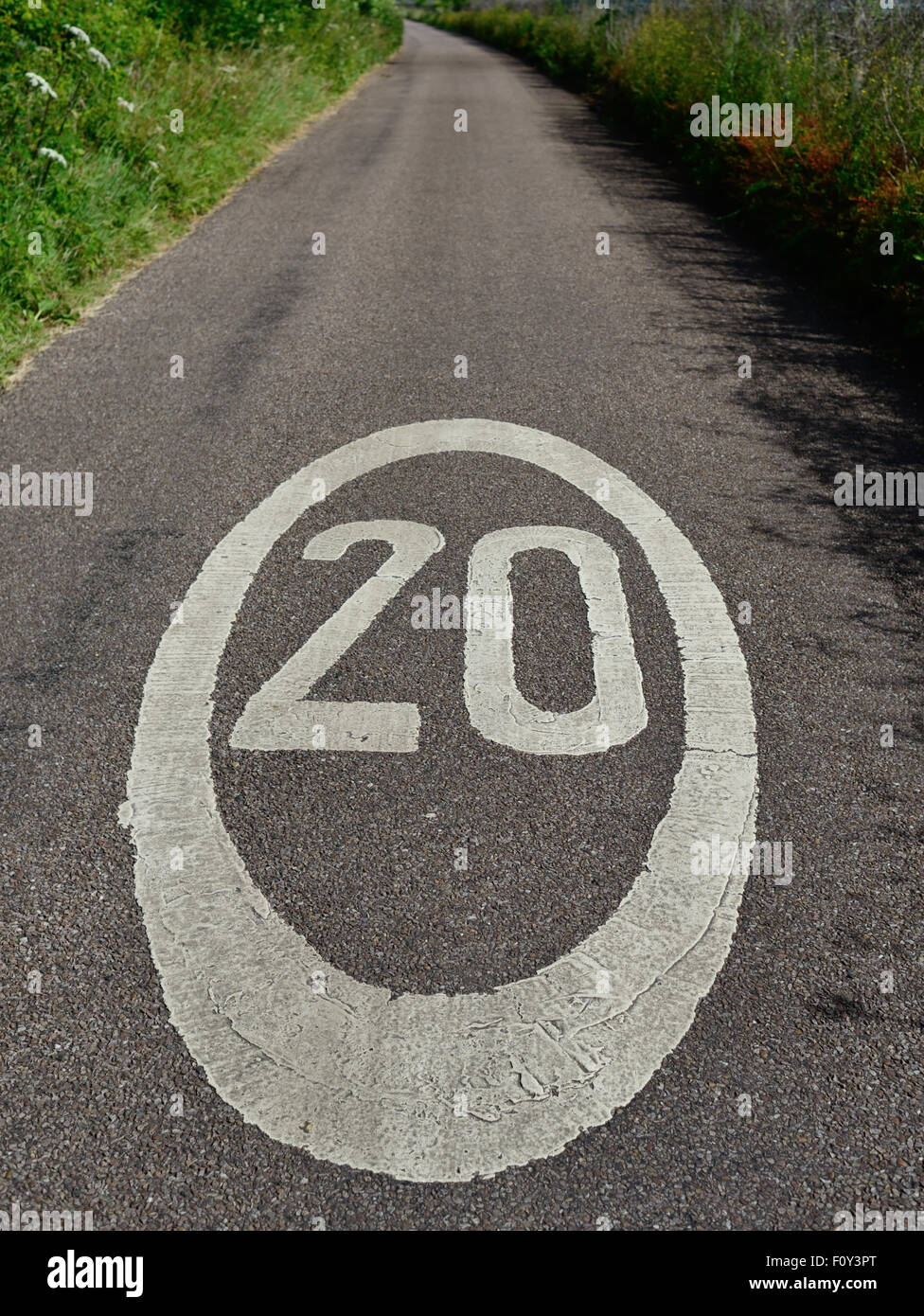 20 mph speed limit sign on minor country road Stock Photo - Alamy