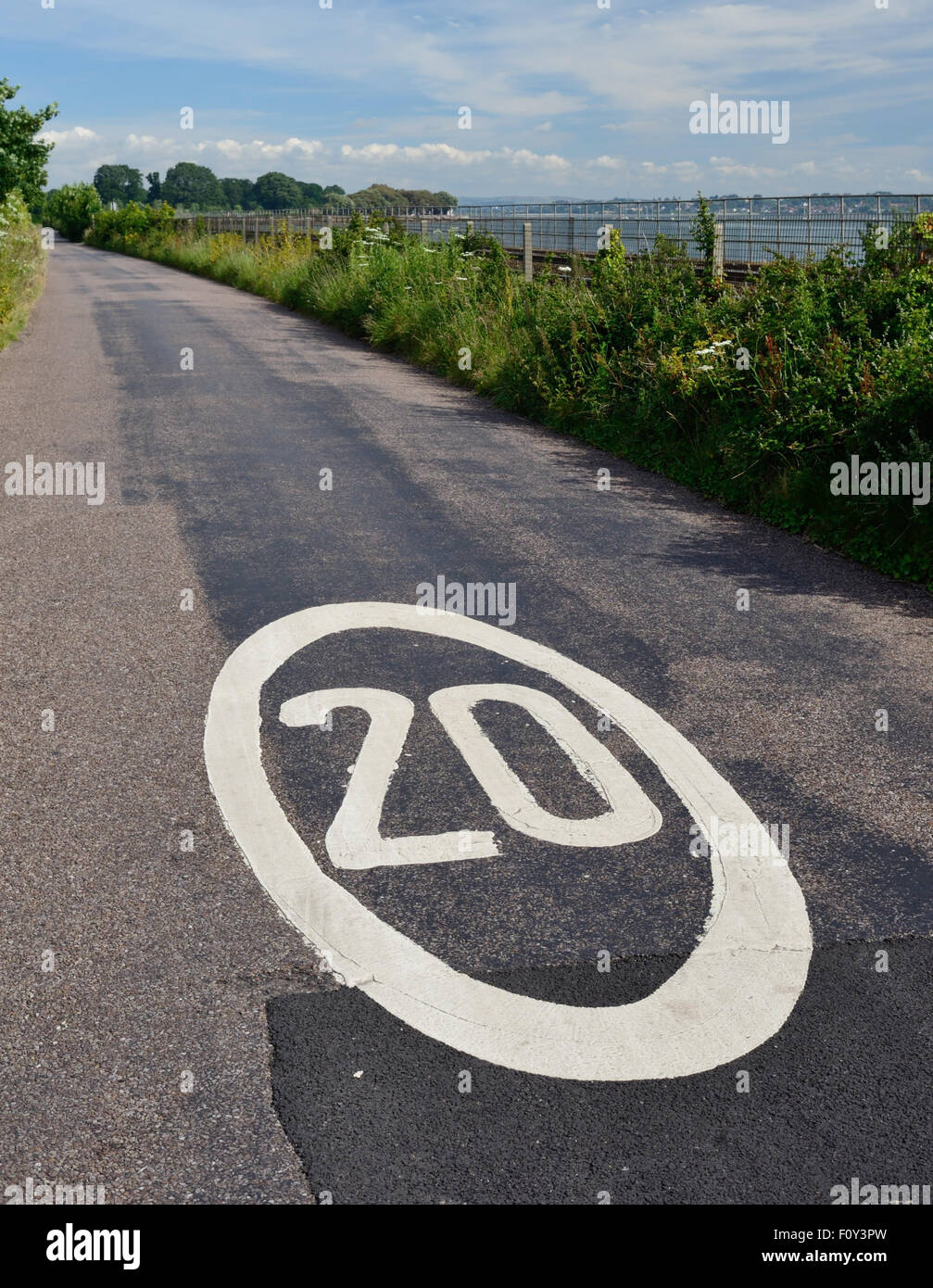 20 mph speed limit sign on minor country road Stock Photo - Alamy