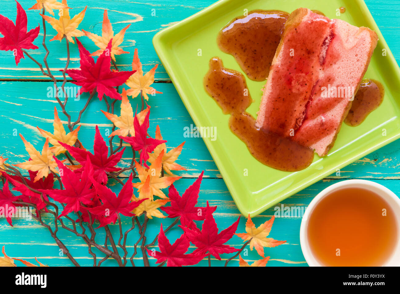 Slice of pink strawberry cake for tea break Stock Photo - Alamy