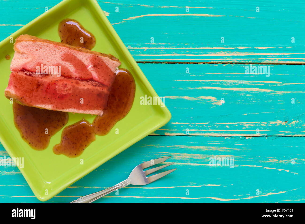 Slice of pink strawberry cake for tea break Stock Photo - Alamy