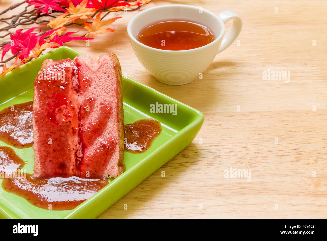 Slice of pink strawberry cake for tea break Stock Photo - Alamy