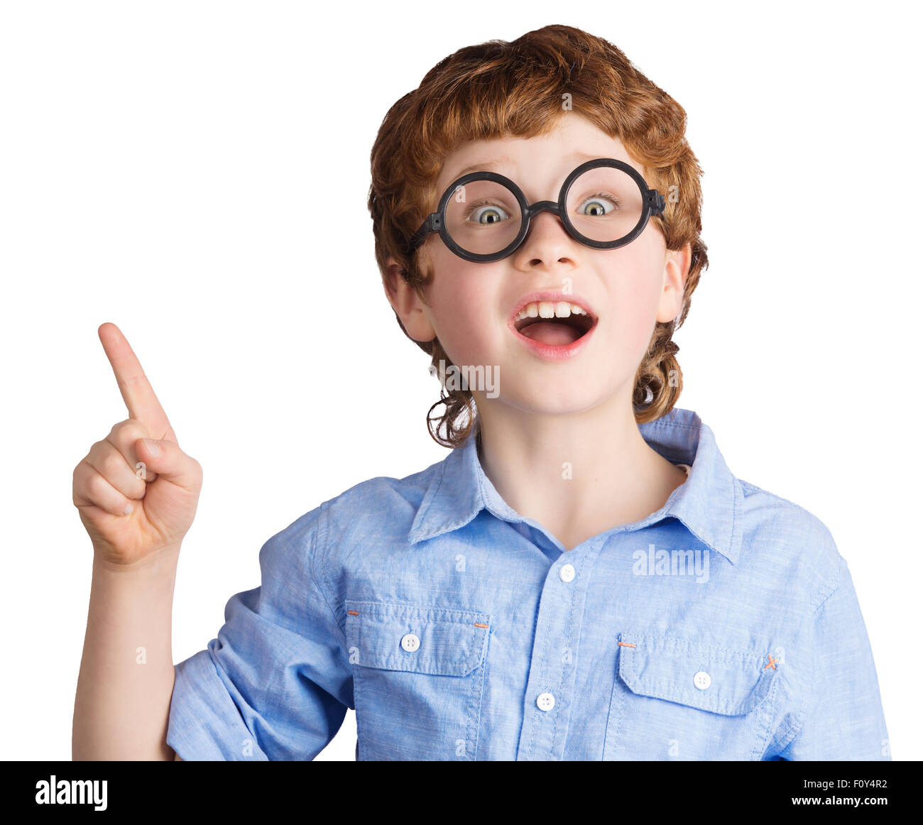 Portrait of handsome boy in round glasses who just has got an idea ...