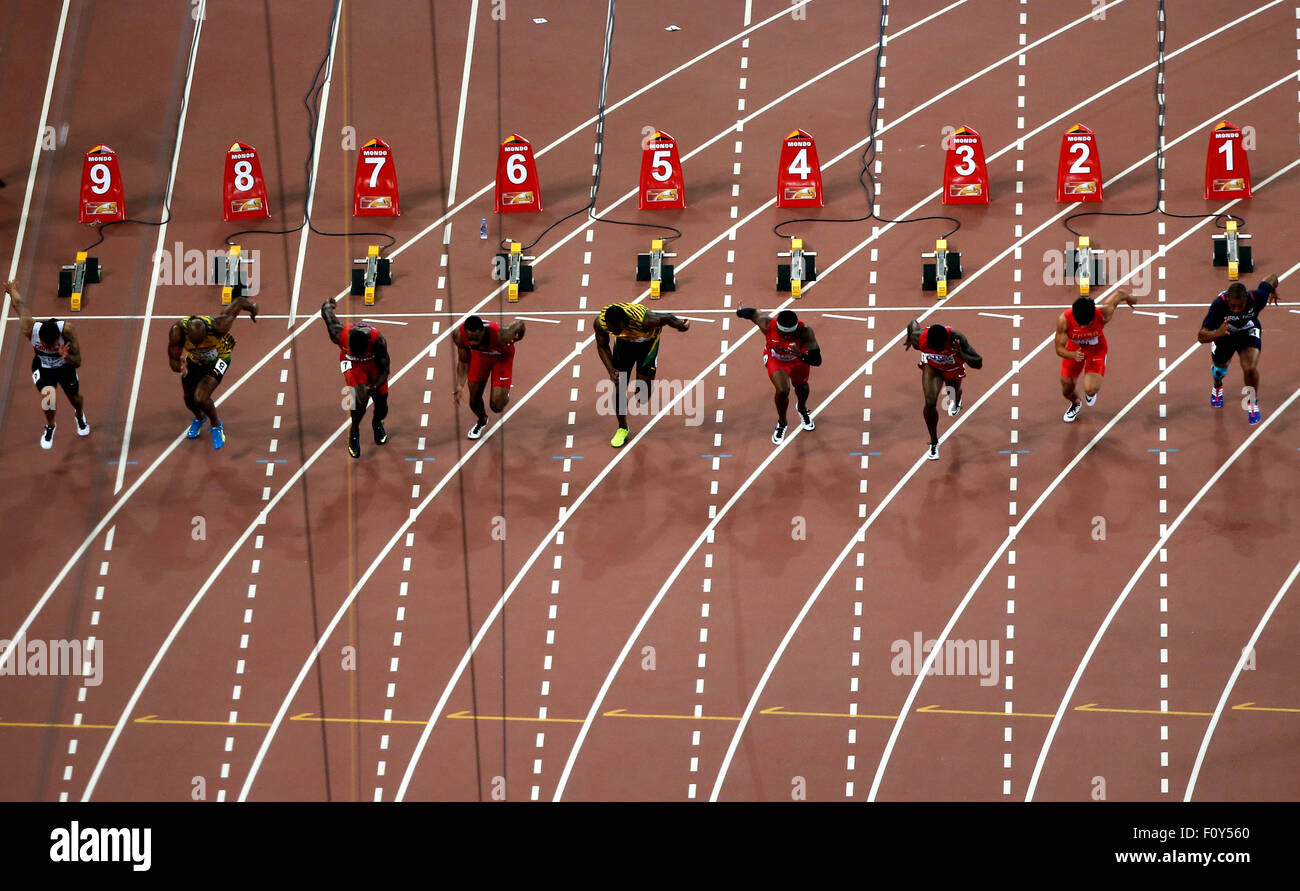 Beijing, China. 23rd Aug, 2015. Sprinters start off during the men's ...