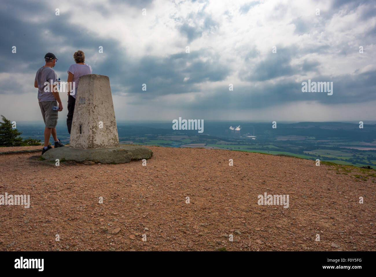 Two people enjoying the View from the top of the Wrekin Hill in Telford ...