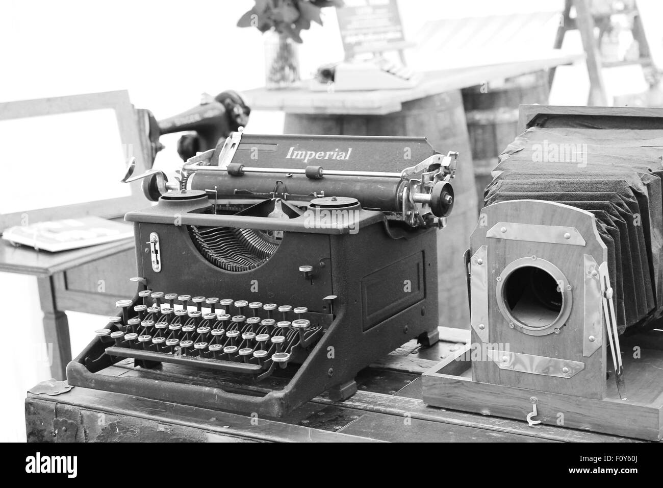 Typewriter and old camera Stock Photo - Alamy