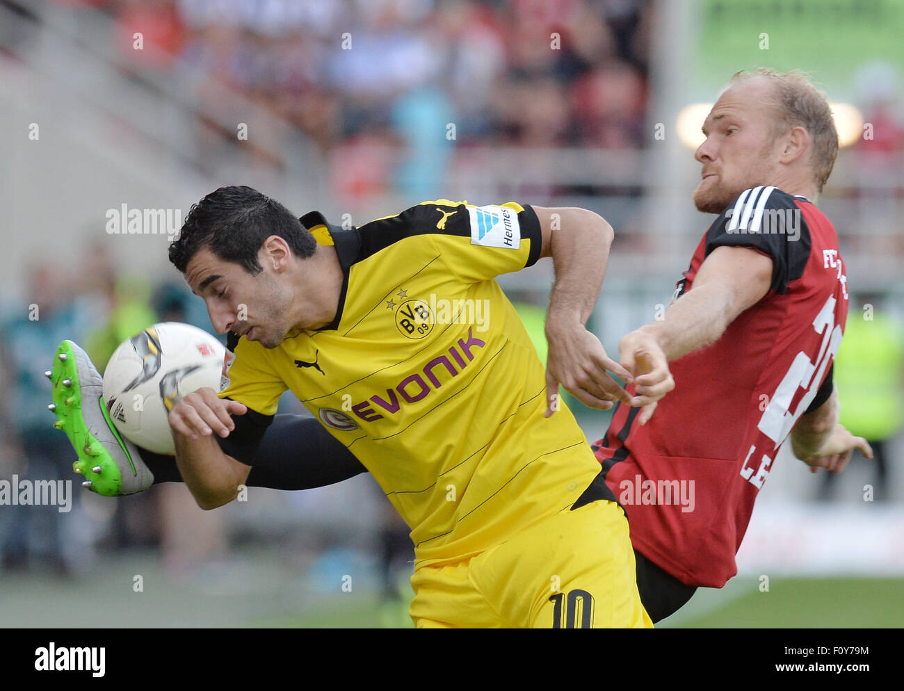 Ingolstadt, Germany. 23rd Aug, 2015. Ingolstadt's Tobias Levels (R) and ...