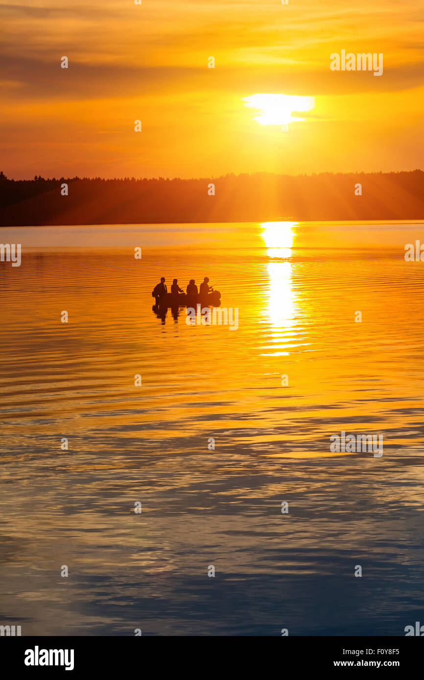 Sunset on a lake Stock Photo - Alamy