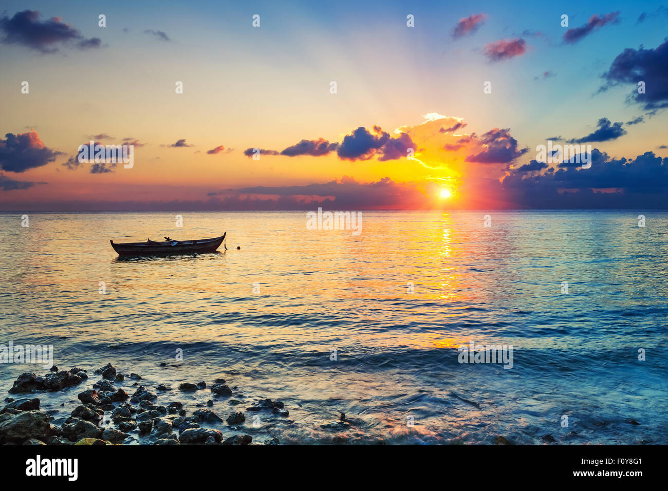 Sunrise over ocean Stock Photo - Alamy