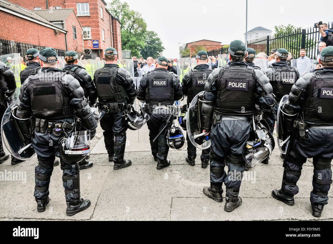 Belfast, Northern Ireland. 23 Aug 2015 - PSNI in riot gear and shields ...
