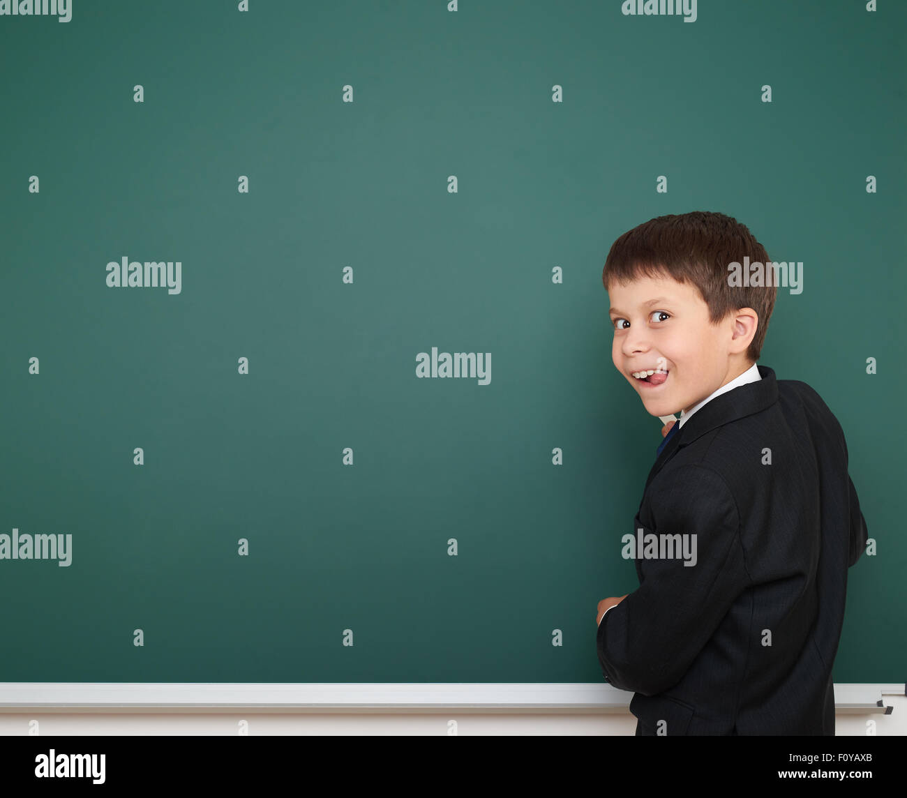 school boy on empty board stand back Stock Photo - Alamy