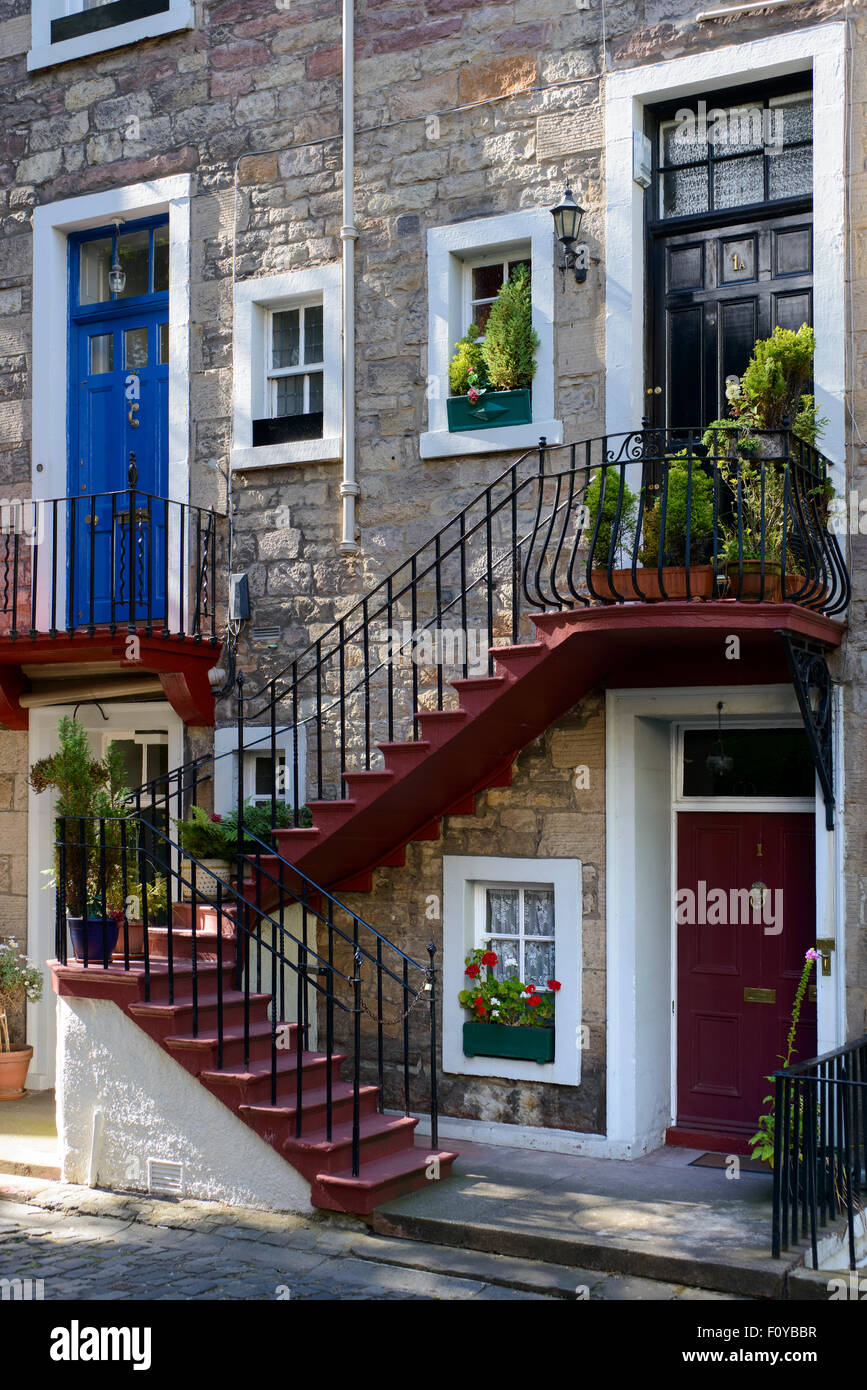 Several house entrances and staircase in a side street of Edinburgh ...