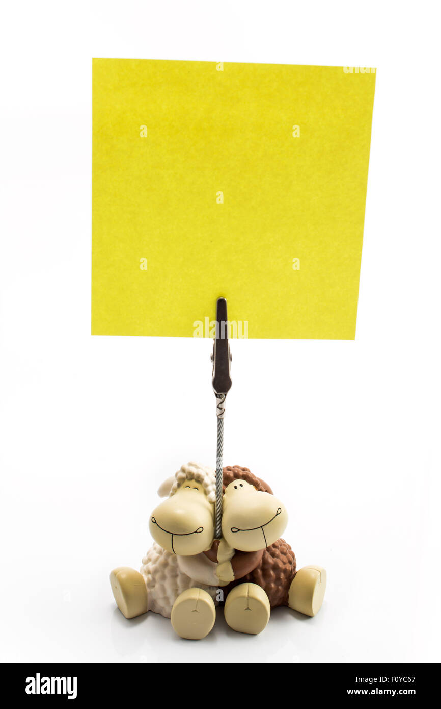 Blank sticky note with clip and figurines sheep Stock Photo - Alamy