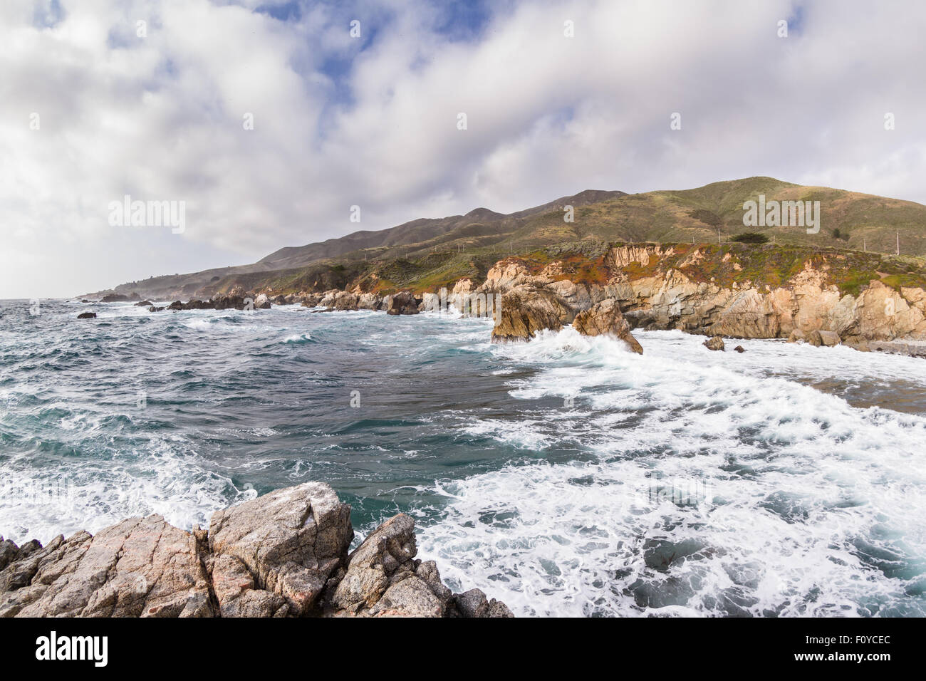 beautiful scene of the California coast on a cloudy day with its ...