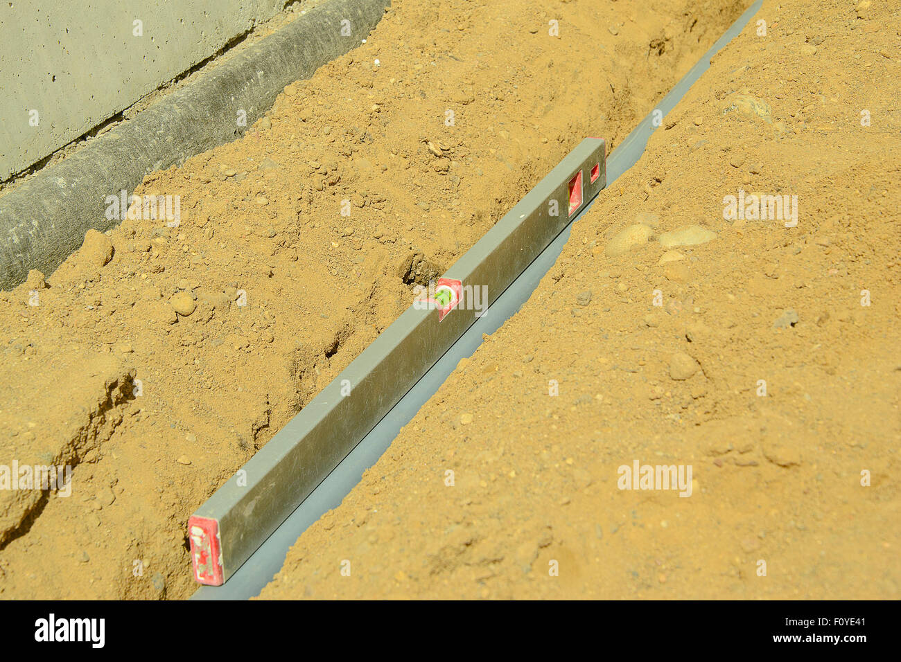Laying Sewer Pipes in the Ground Stock Photo - Alamy