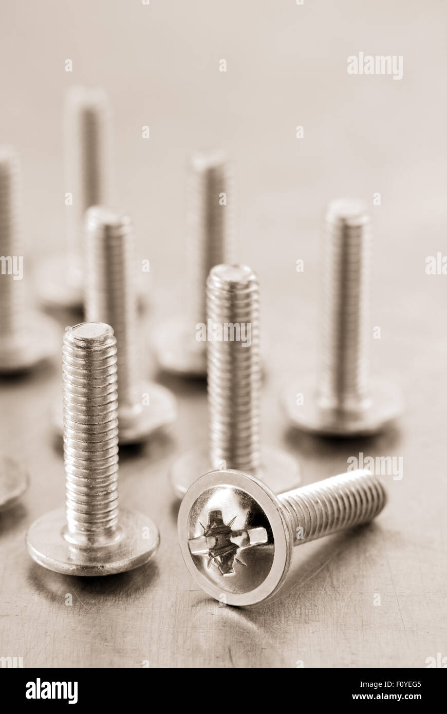 bolts tool at metal background texture Stock Photo - Alamy