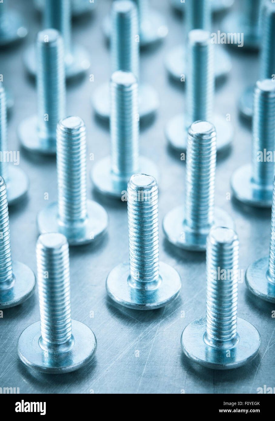 bolts tool at metal background texture Stock Photo - Alamy