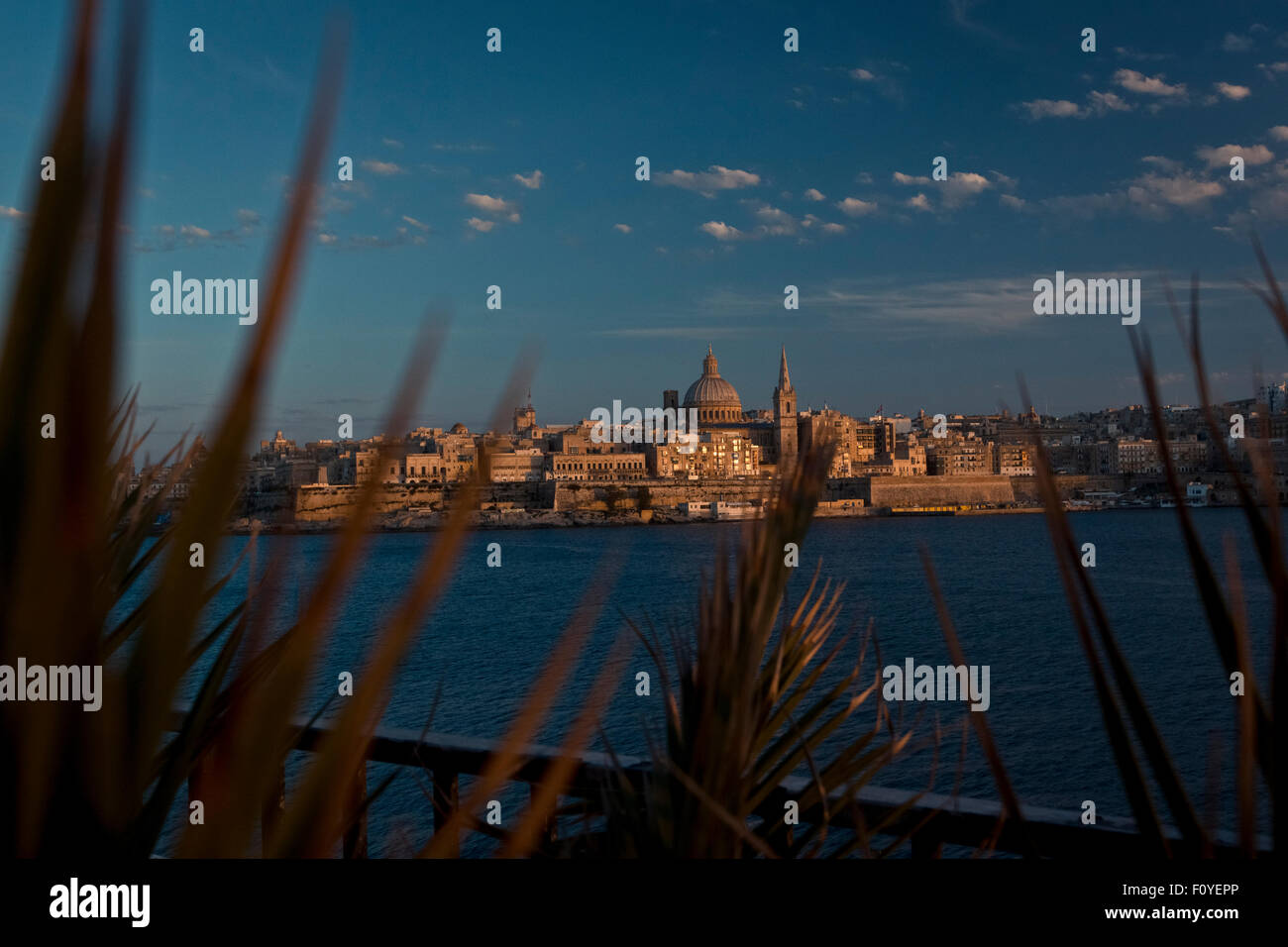 View across to city of Valletta, Malta at sunset Stock Photo - Alamy