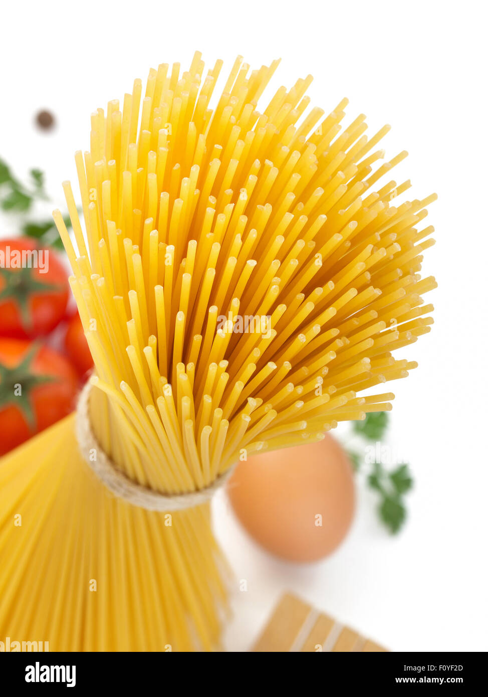 bunch of spaghetti isolated on white background Stock Photo - Alamy