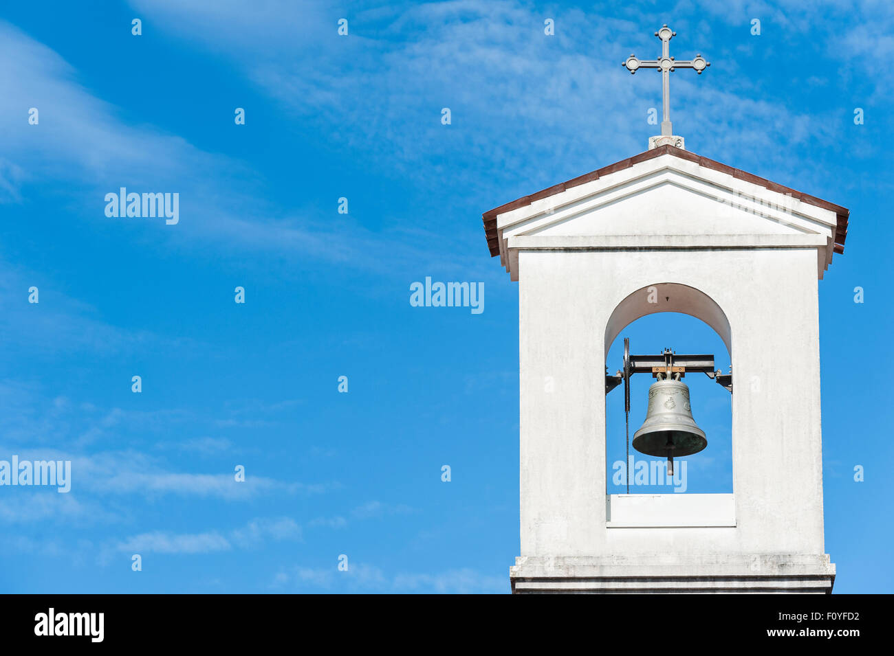 Small bell tower with a bell of a country church i Stock Photo - Alamy