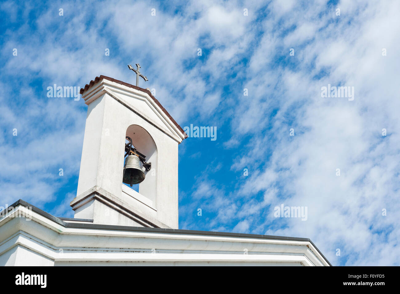 Small bell tower with a bell of a country church i Stock Photo - Alamy