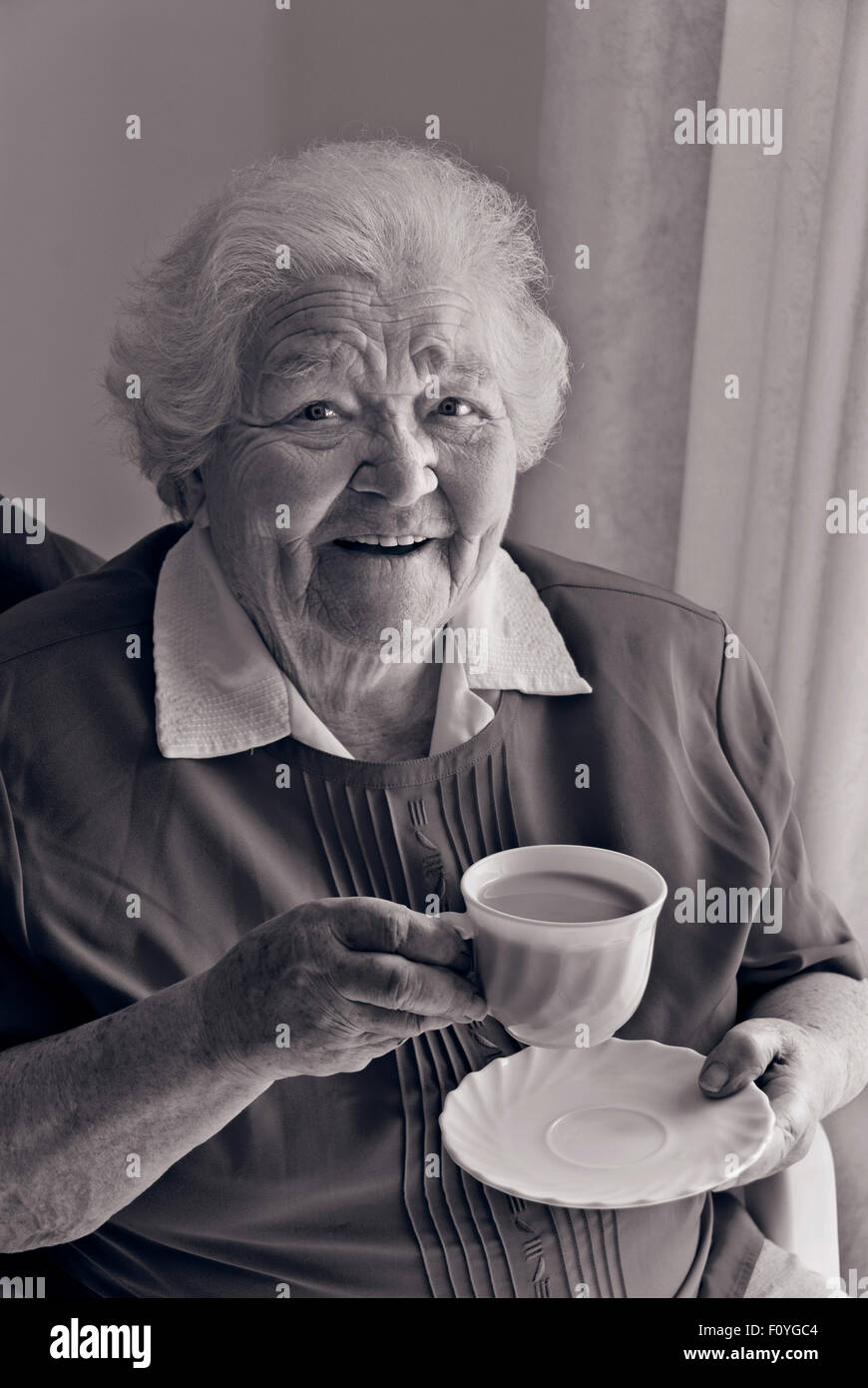 B&W RGB conversion image Happy contented senior old elderly lady ...