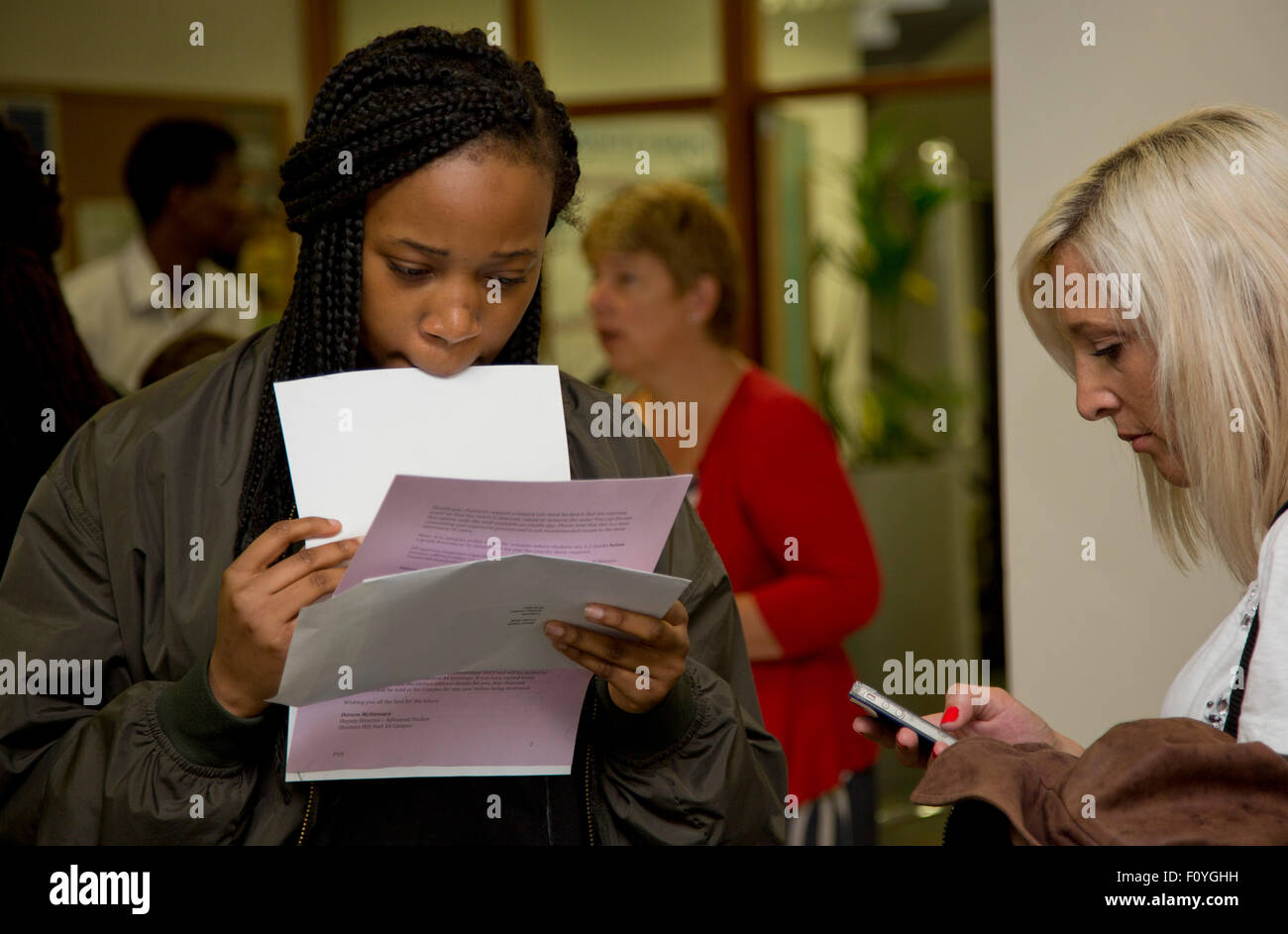 Students with their exam results Stock Photo - Alamy