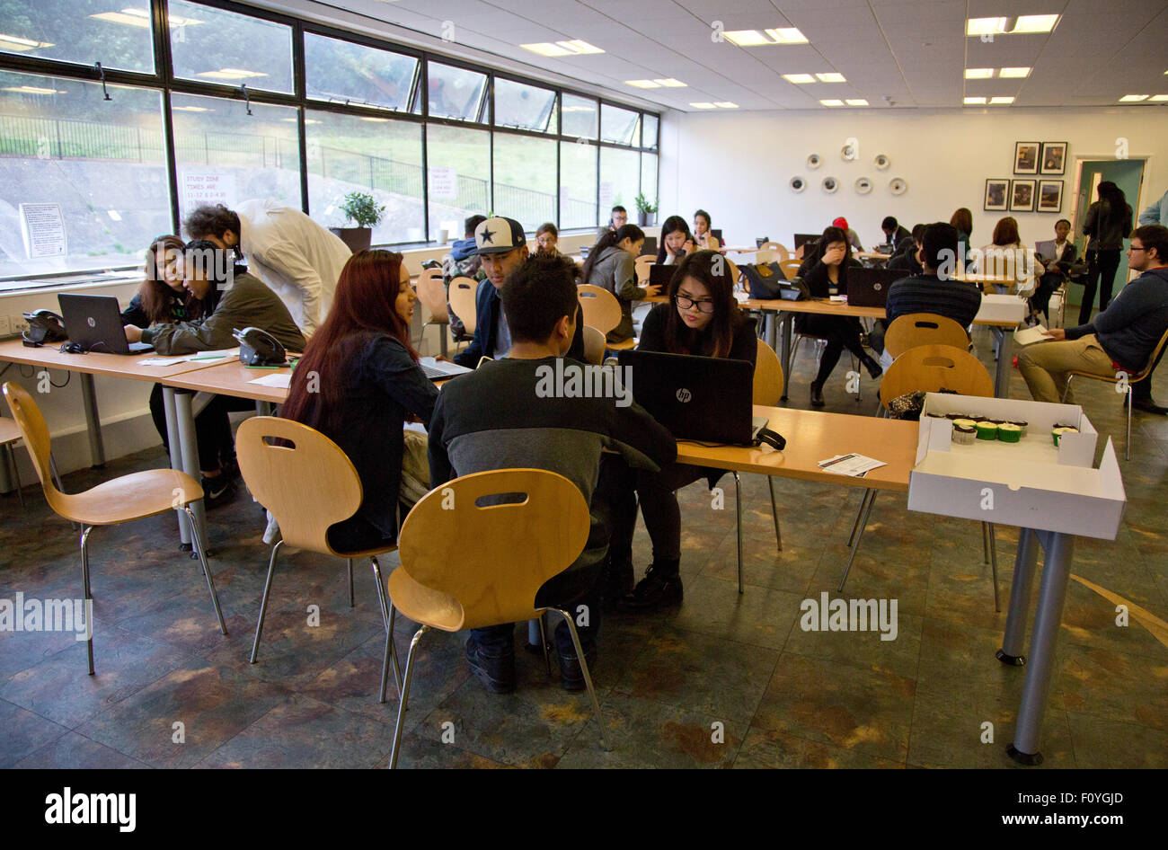 Students going though the UCAS clearing process after collecting their ...