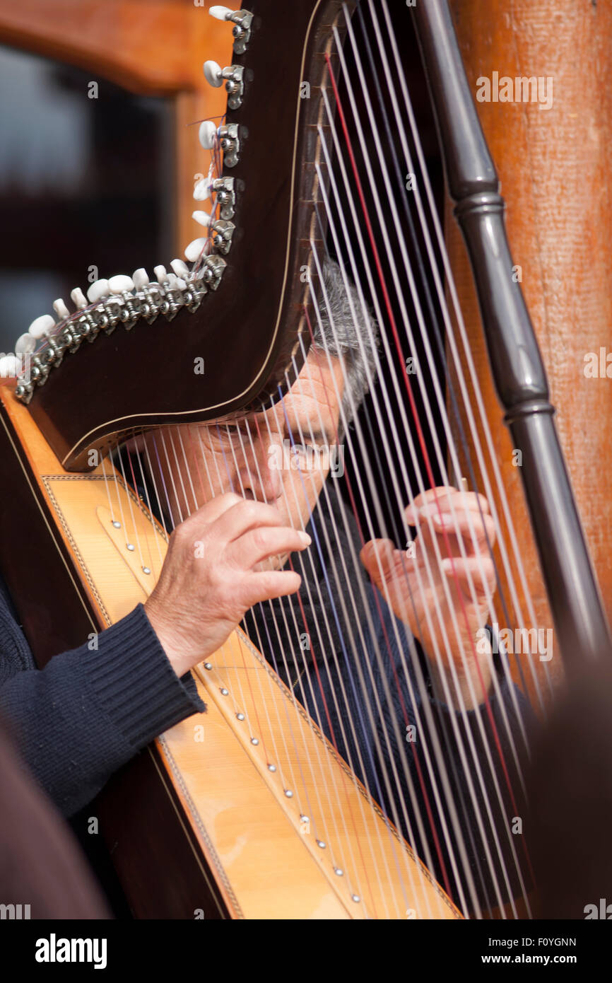 Harpist man hi-res stock photography and images - Alamy