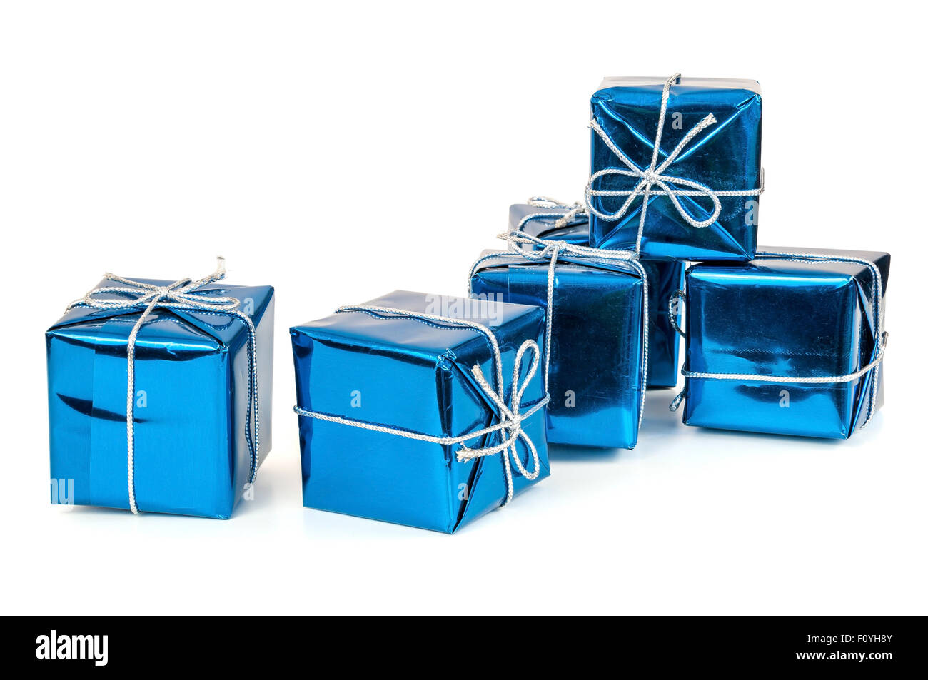 Group of blue gift boxes with silver ribbons isolated on white ...