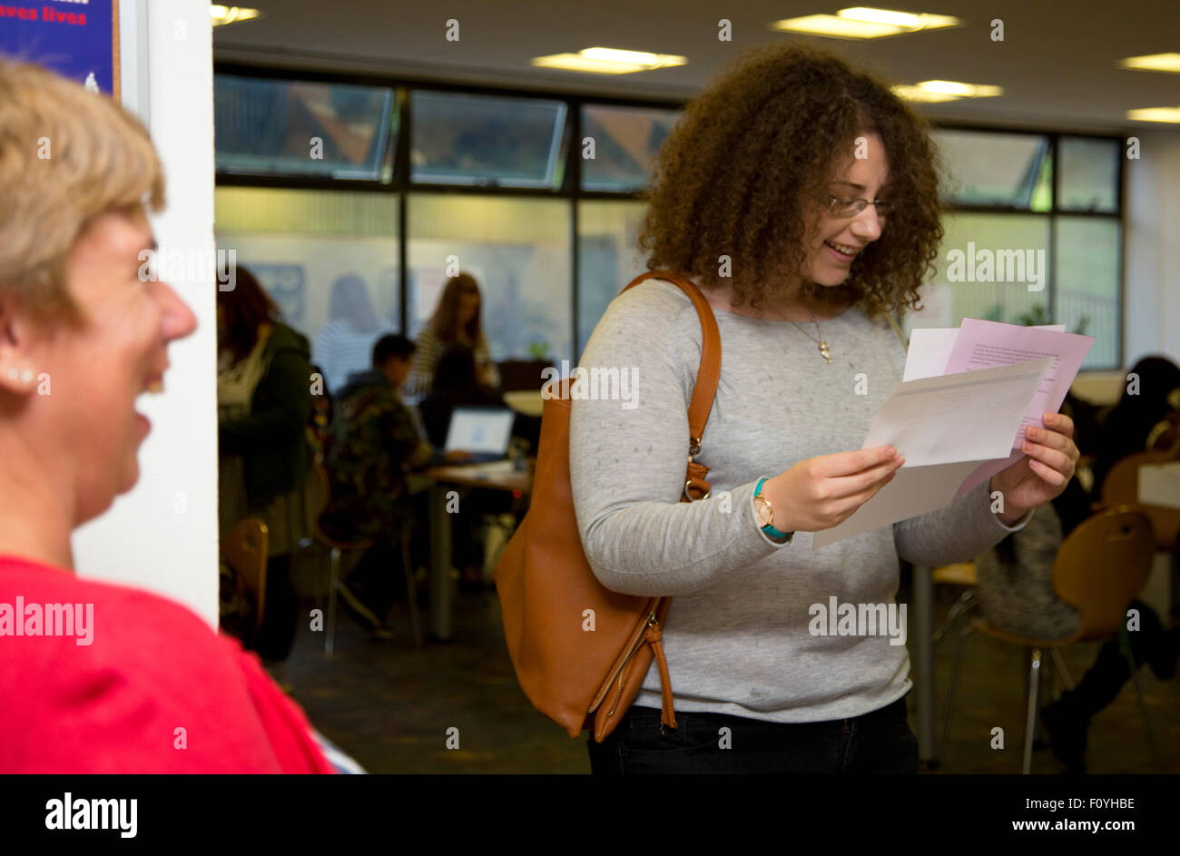 Students collecting A level results and successfully getting into ...