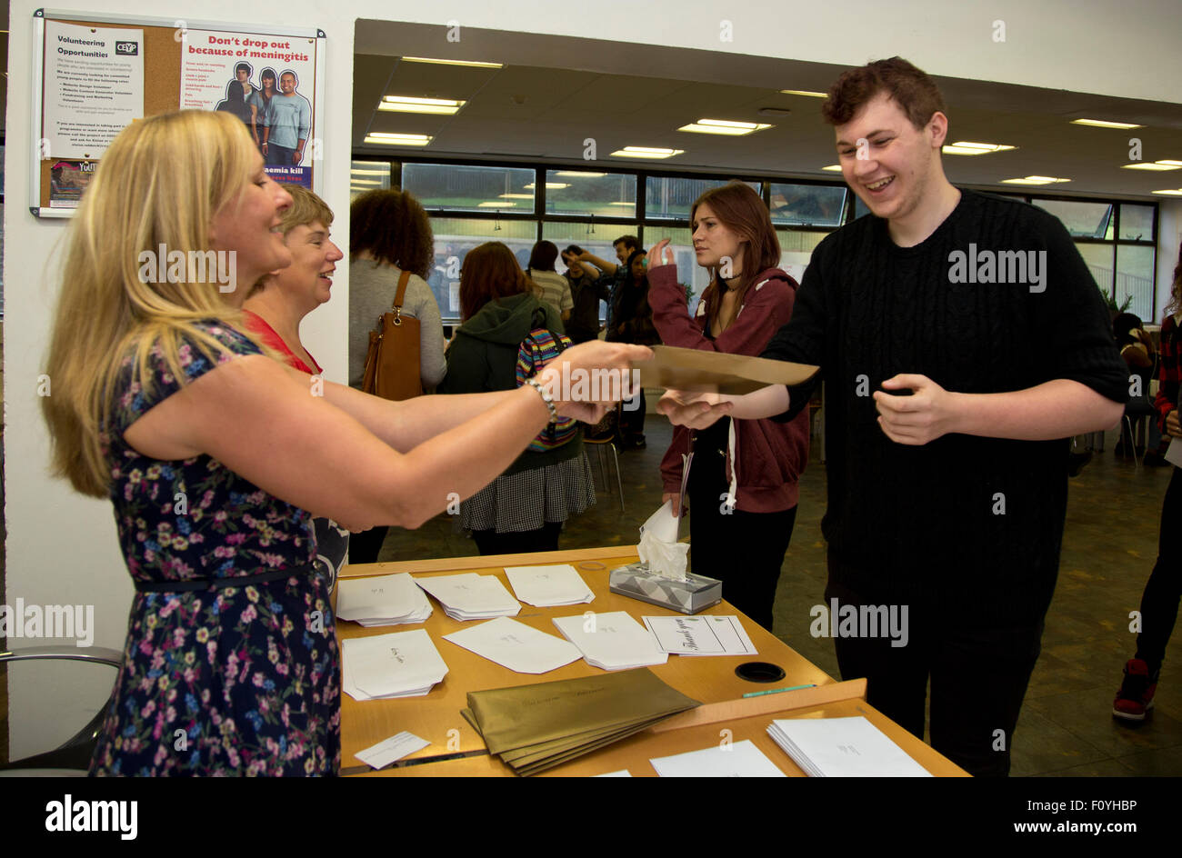 Students collecting A level results and successfully getting into ...