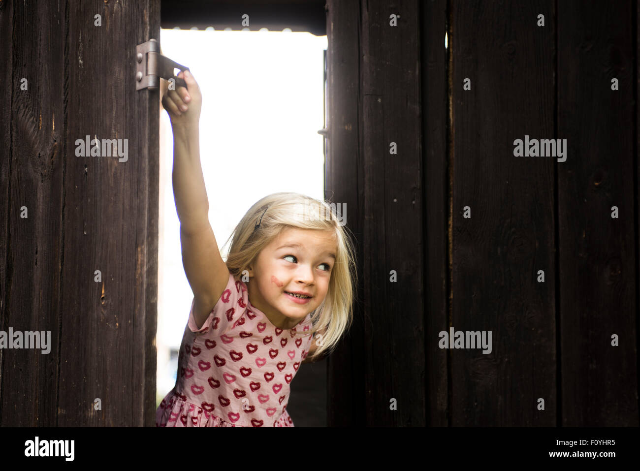 Girl By Wooden Gate High Resolution Stock Photography and Images - Alamy