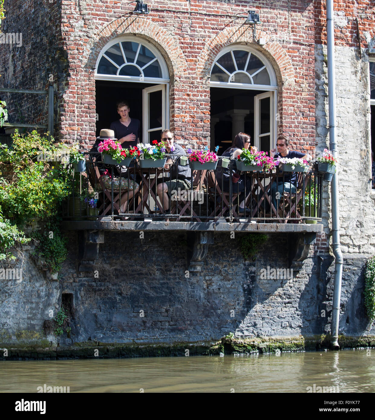 Riverside view on the Scheldt in the historic district of Ghent ...