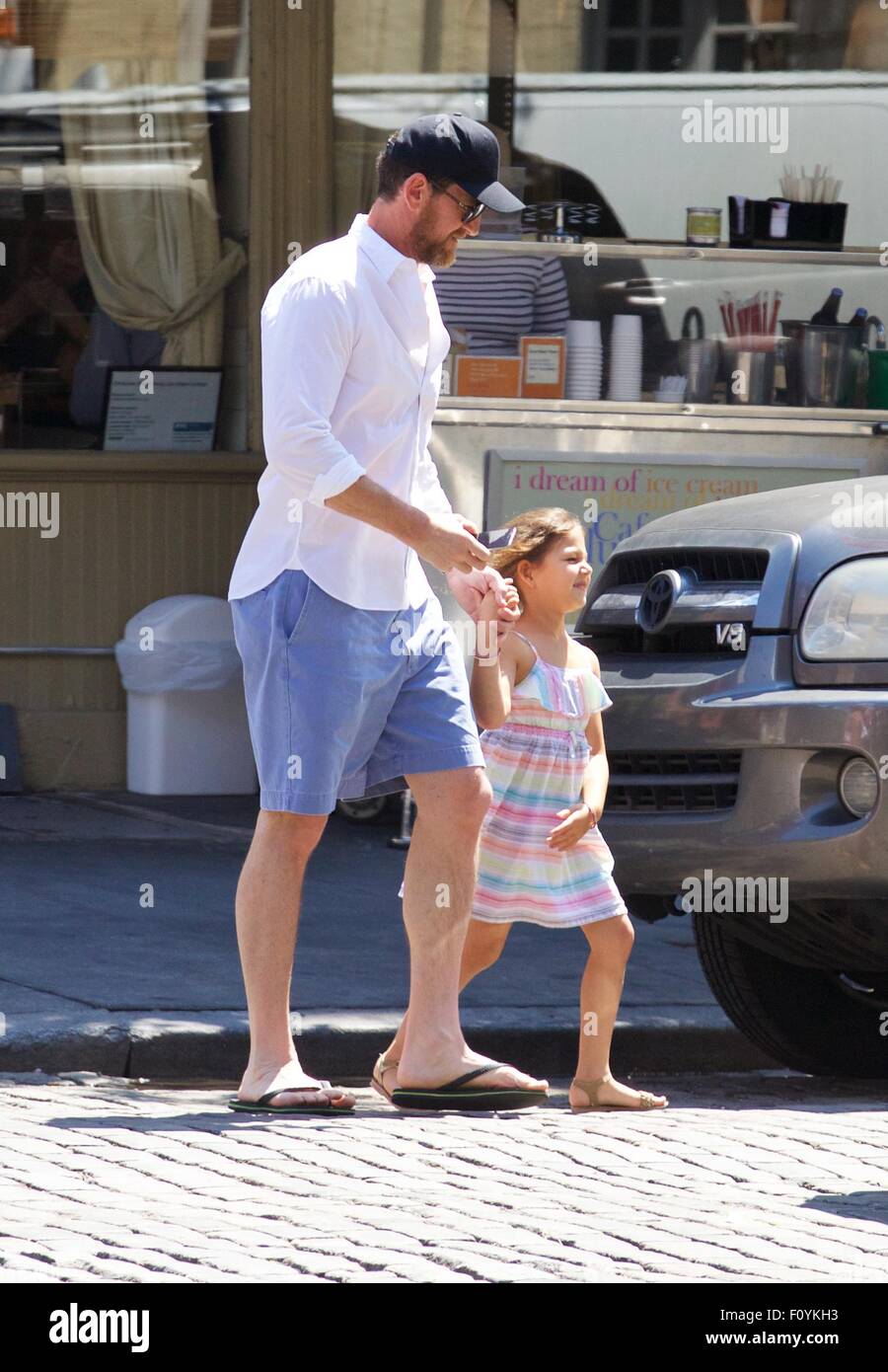Adam Dell out and about in the West Village with daughter Krishna ...