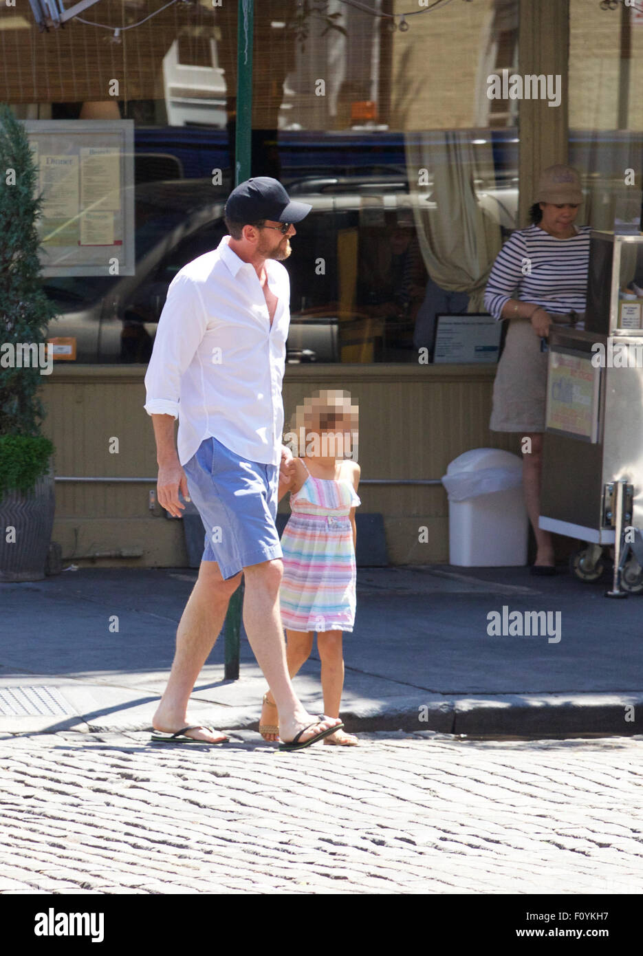 Adam Dell out and about in the West Village with daughter Krishna ...
