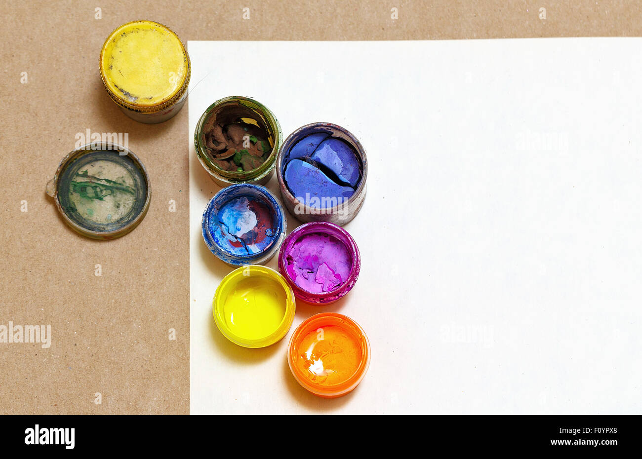 Colorful gouache on a sheet of paper. Tools of the artist. The creative ...