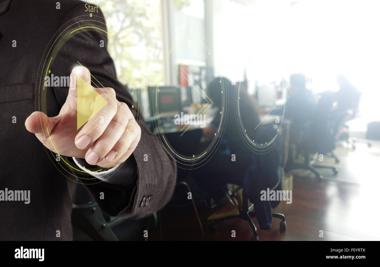 Businessman hand press play hi-res stock photography and images - Alamy