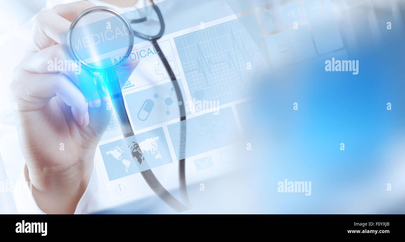 Medicine doctor hand working with modern computer interface as medical ...