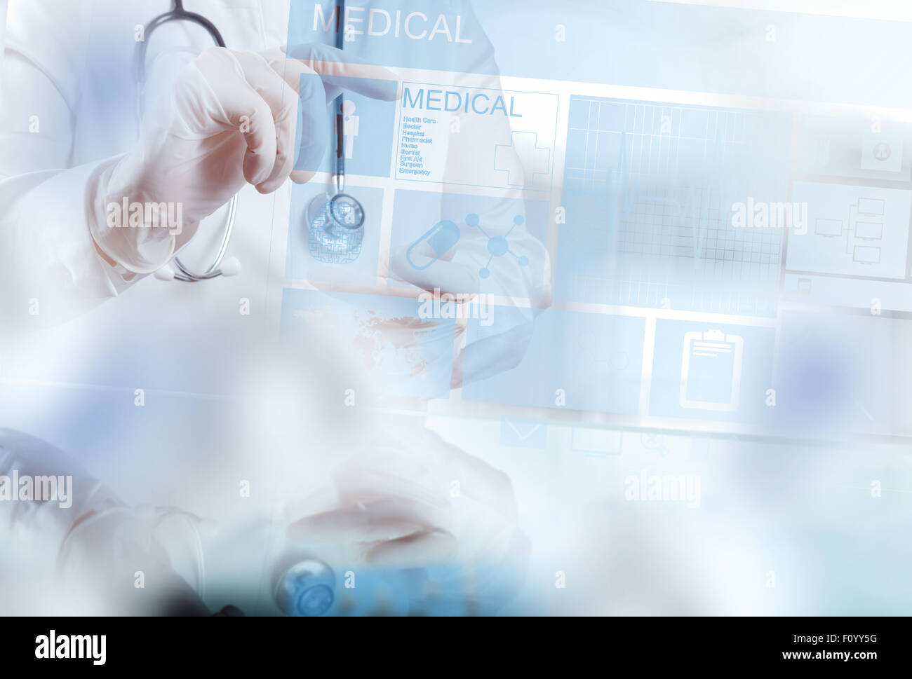 Medicine doctor hand working with modern computer interface as medical ...