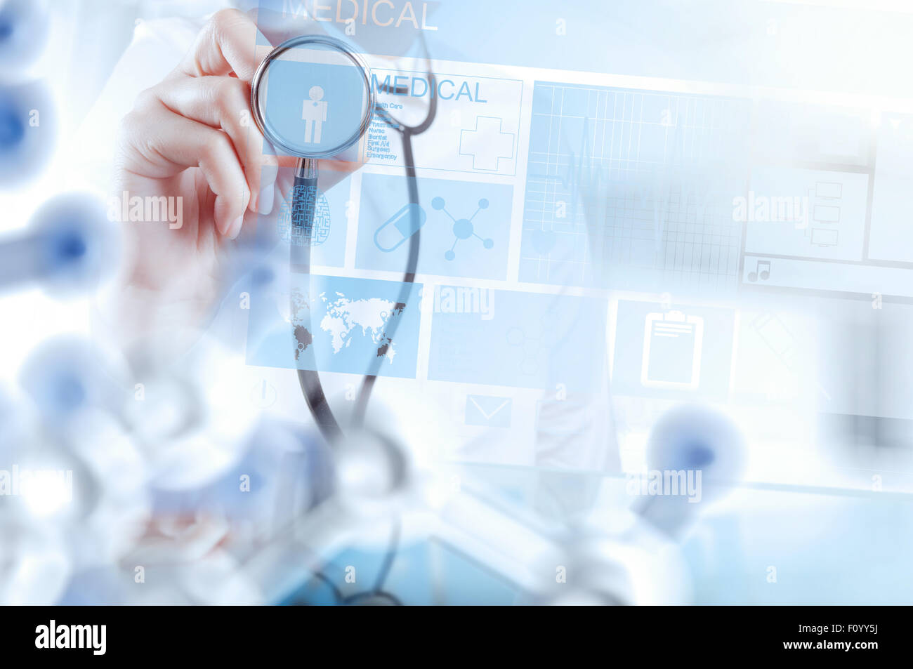 Medicine doctor hand working with modern computer interface as medical ...