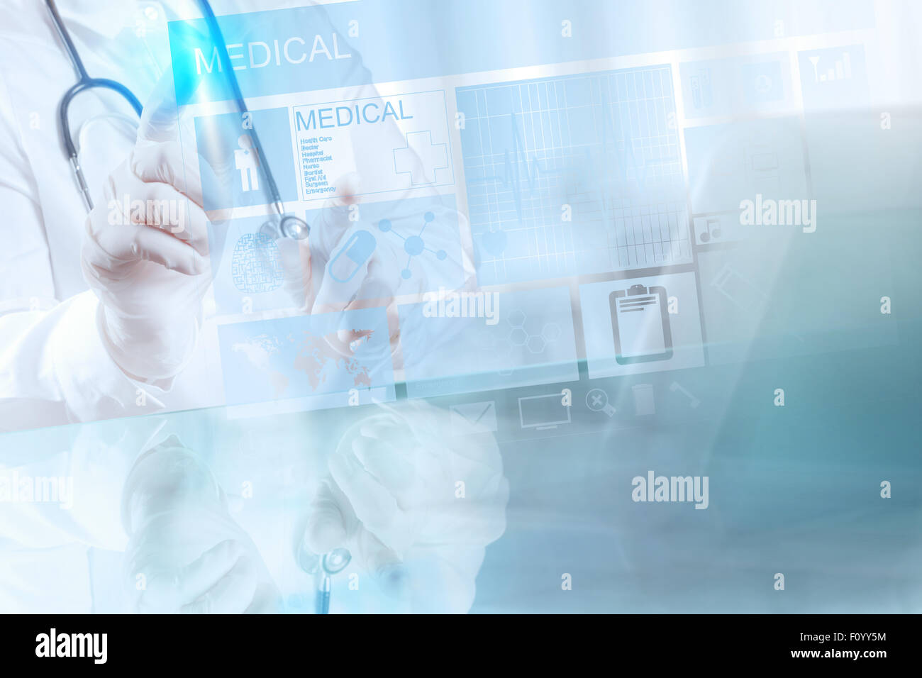 Medicine doctor hand working with modern computer interface as medical ...