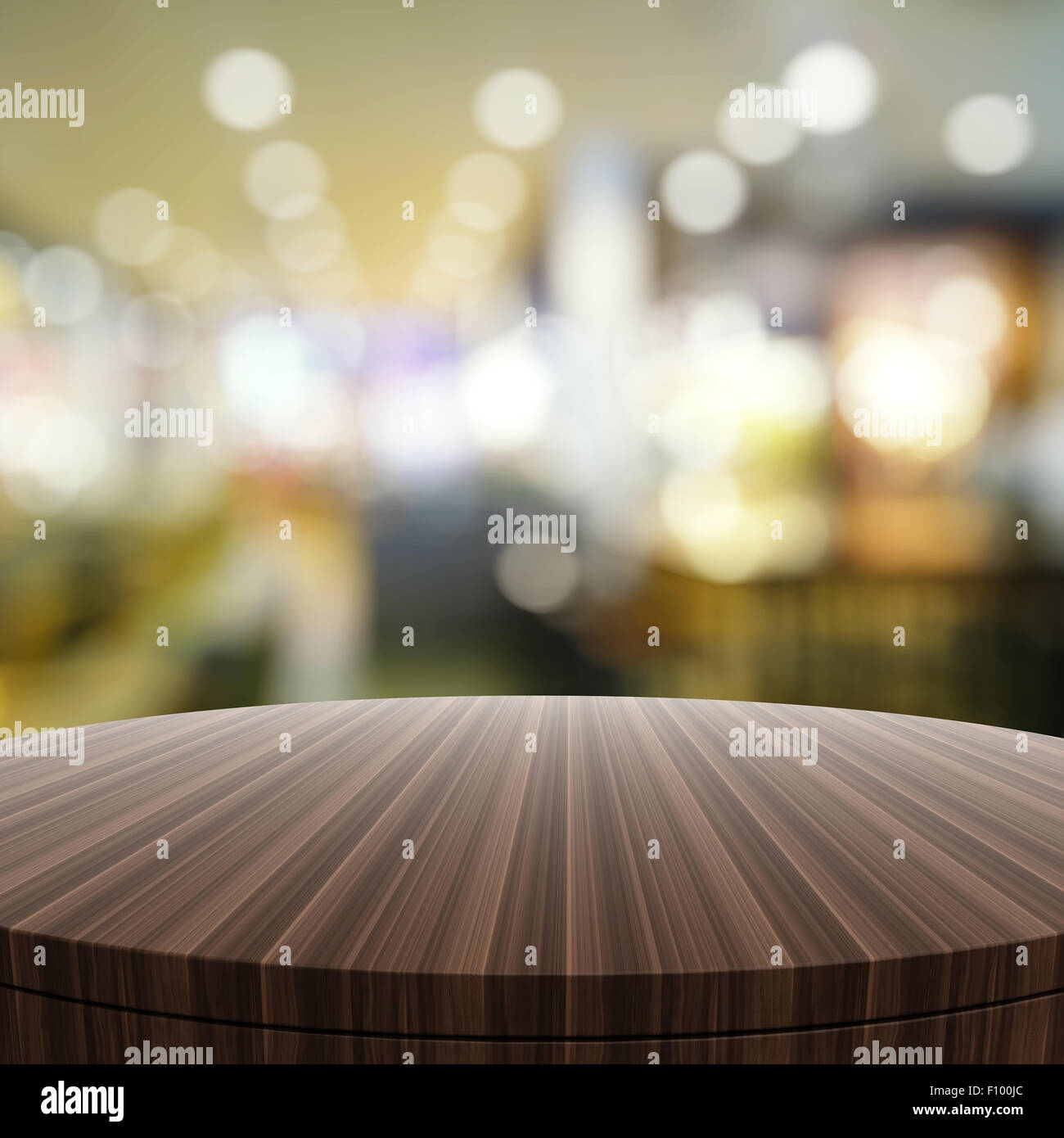 Empty wooden round table and blurred background for product ...