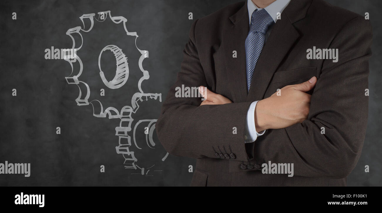 smart businessman with gear to success concept Stock Photo - Alamy