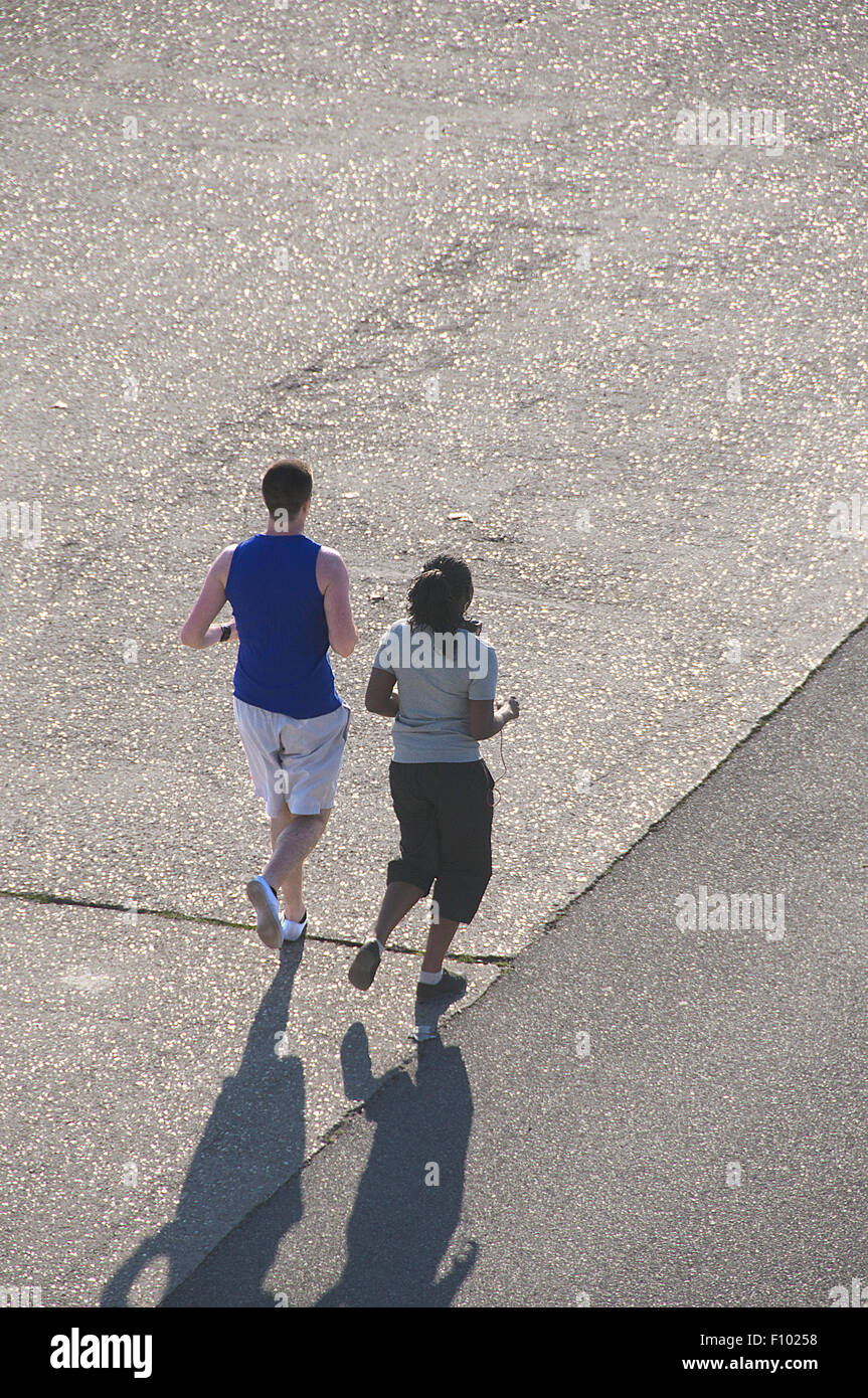Female running back view full length hi-res stock photography and ...