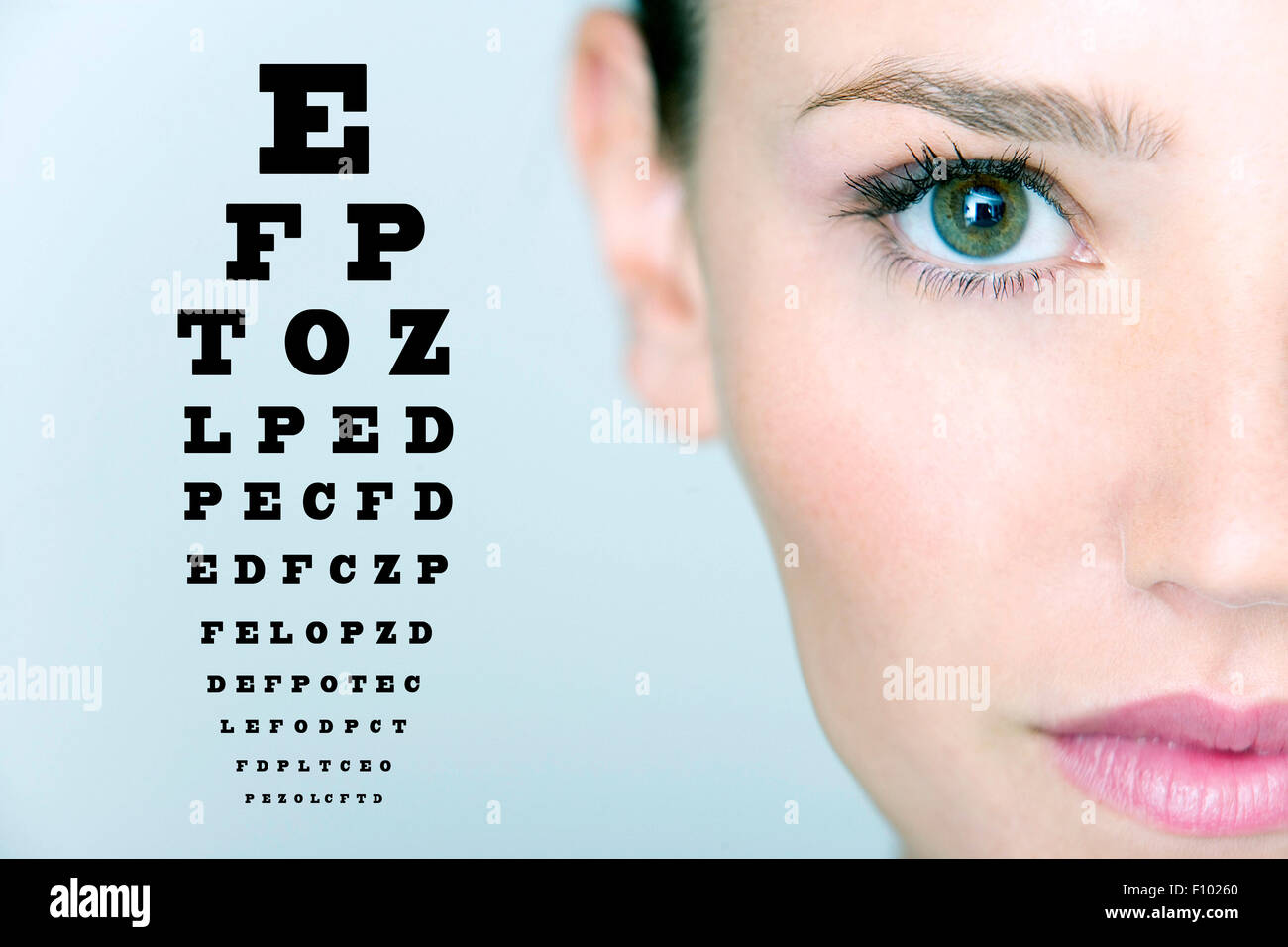 Woman reading eye test chart hi-res stock photography and images - Alamy