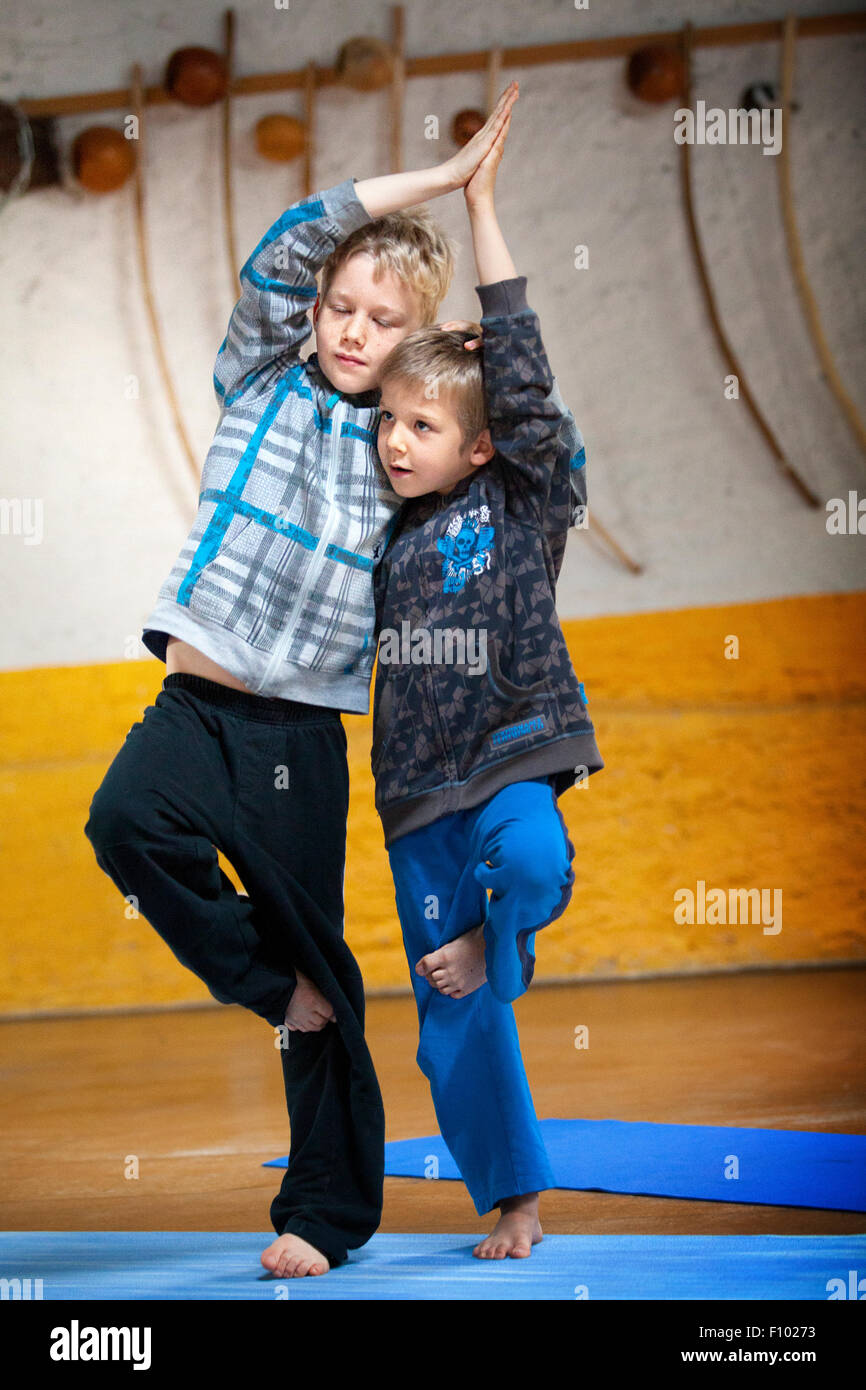 CHILD PRACTICING YOGA Stock Photo - Alamy