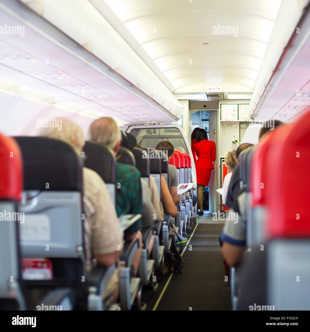 Airplane passengers inside aeroplane hi-res stock photography and ...